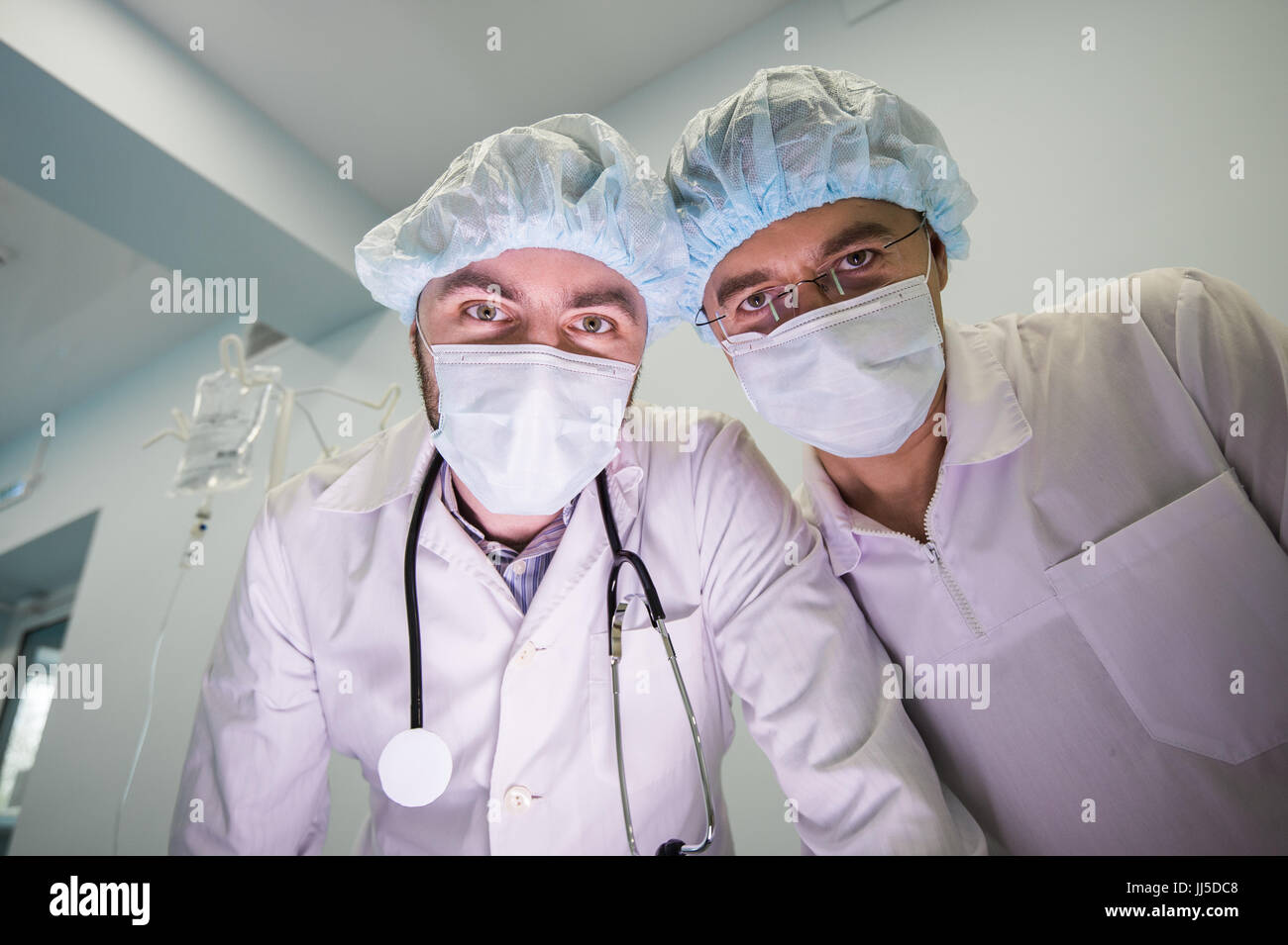 Experienced doctors during the operation at hospital. First point of ...