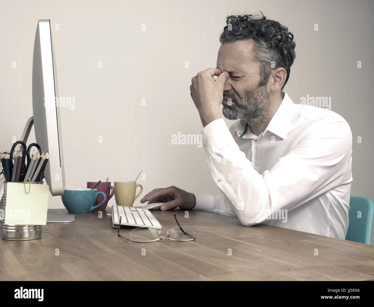 Overwork, deadline business concept, businessman typing on computer at ...
