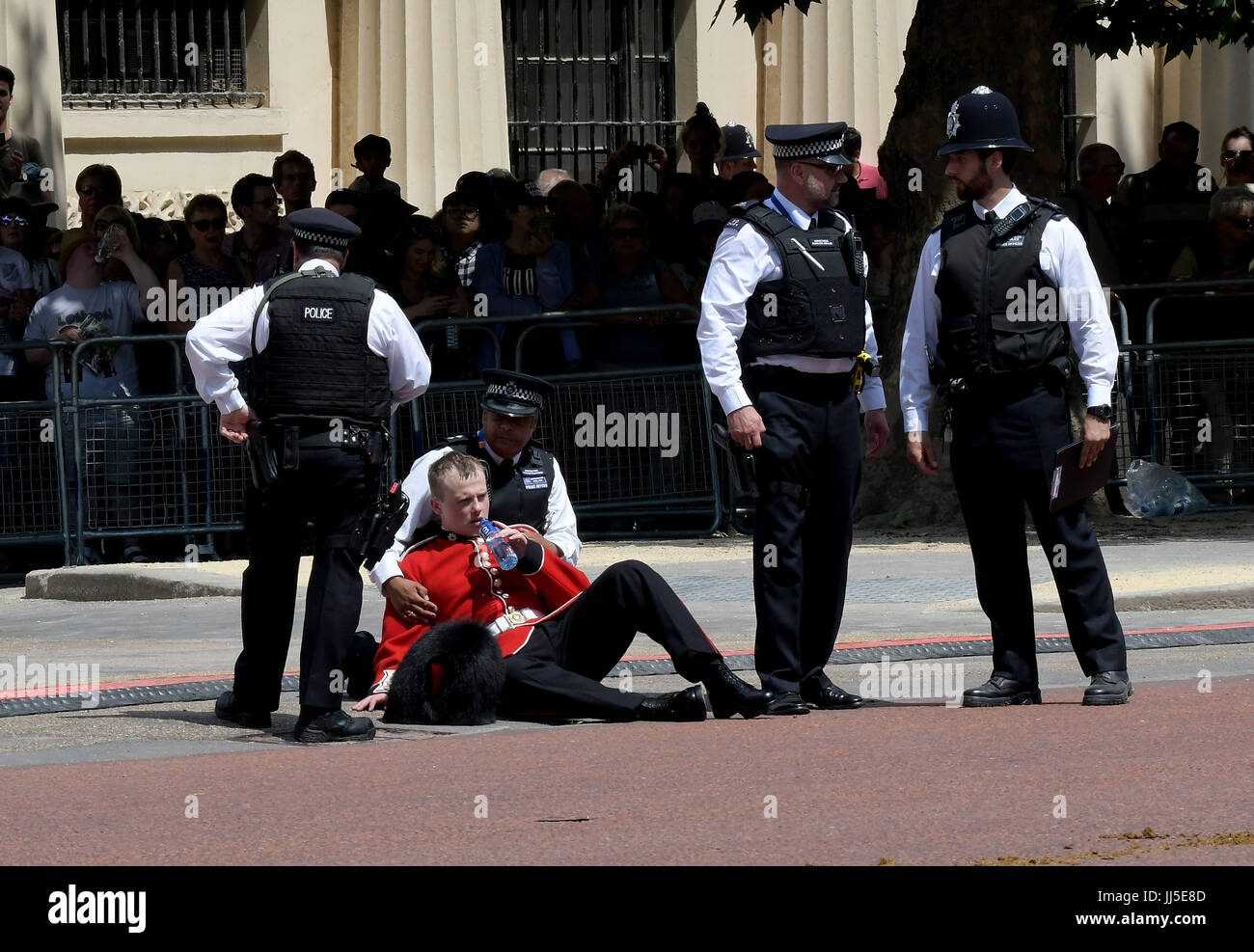 A soldier collapses during Trooping the Colour: The Queen's Birthday ...