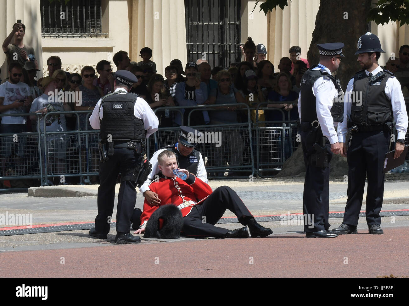 A soldier collapses during Trooping the Colour: The Queen's Birthday ...