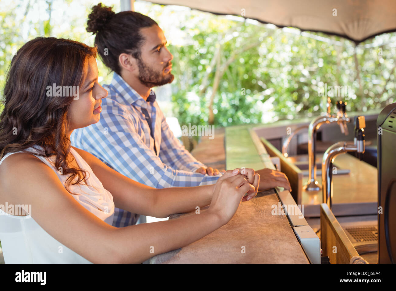 Man sitting at lunch counter hi-res stock photography and images - Alamy