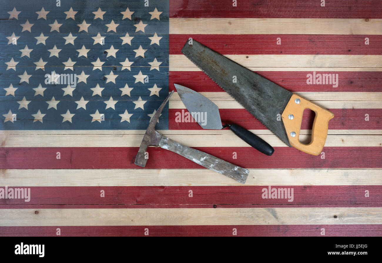 Labor Day background with USA rustic wooden flag and used industrial ...