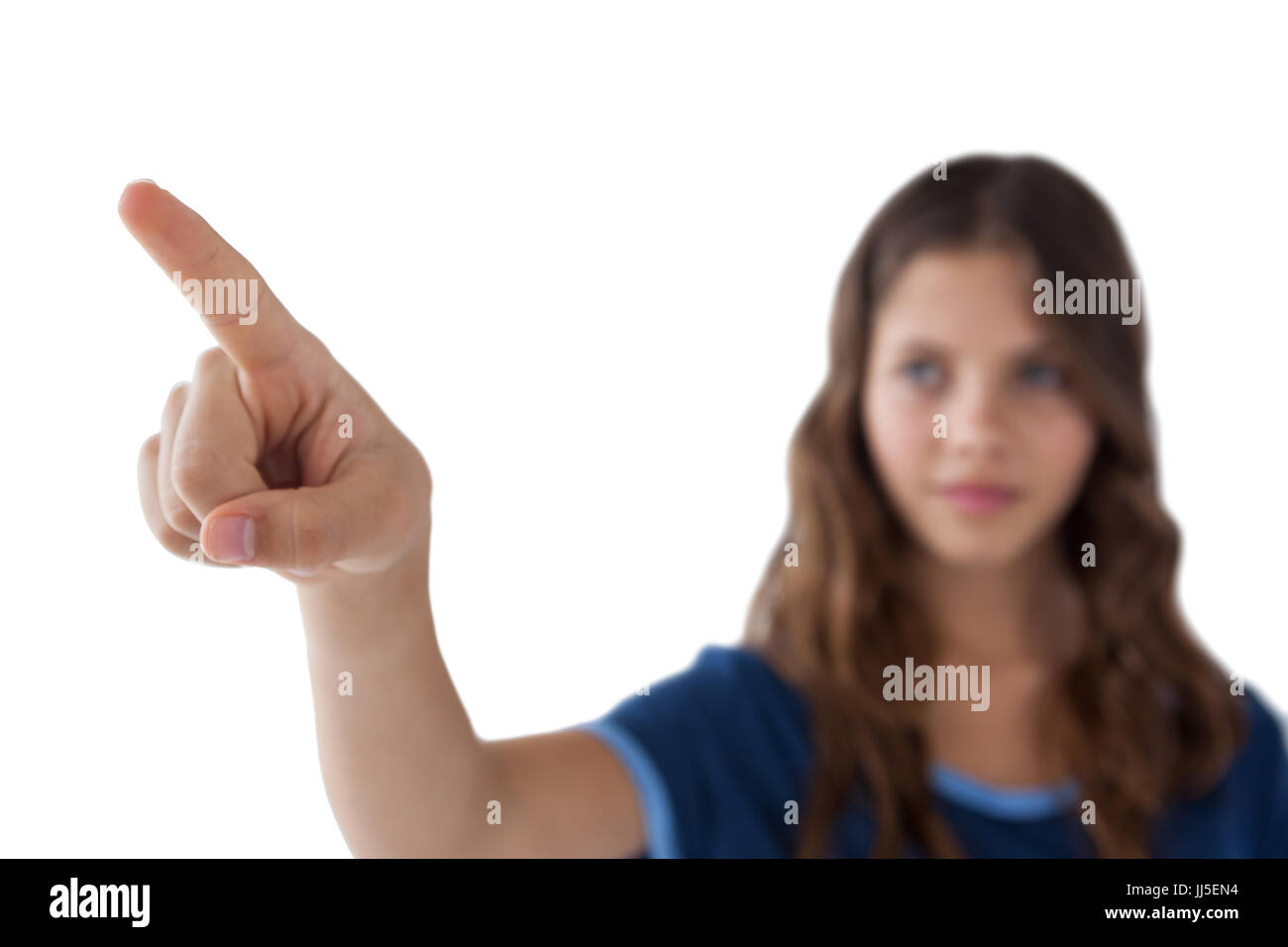 Girl pressing an invisible virtual screen against white background ...