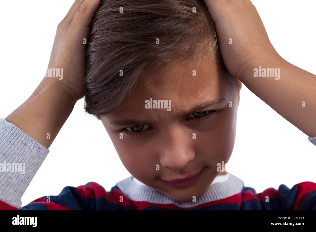 Close-up of cute boy having an headache Stock Photo - Alamy