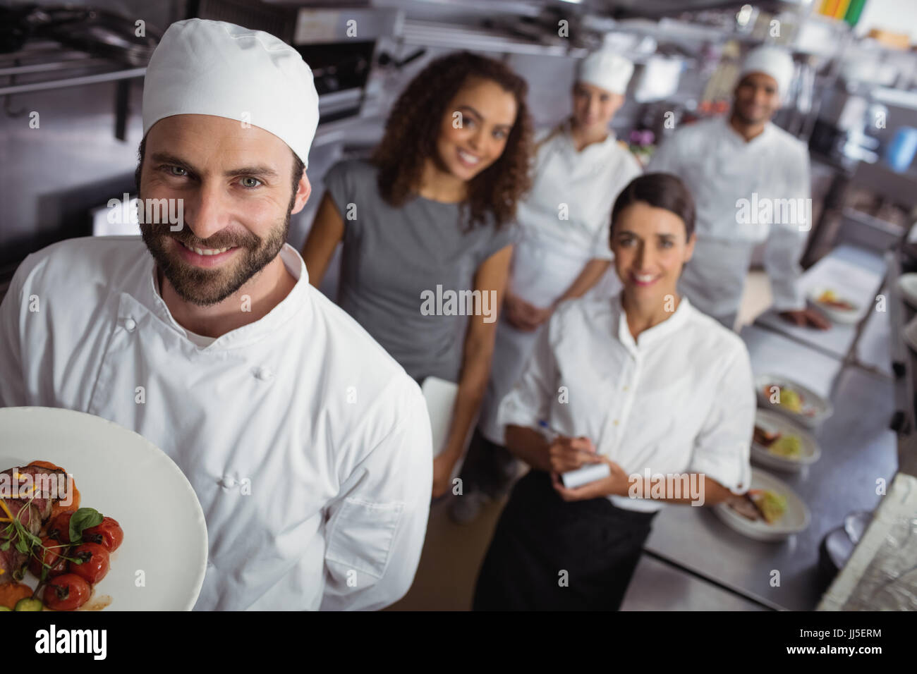 Portrait restaurant manager kitchen staff hi-res stock photography and ...