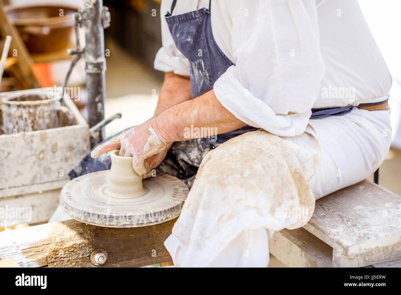 Potter making jugs Stock Photo - Alamy