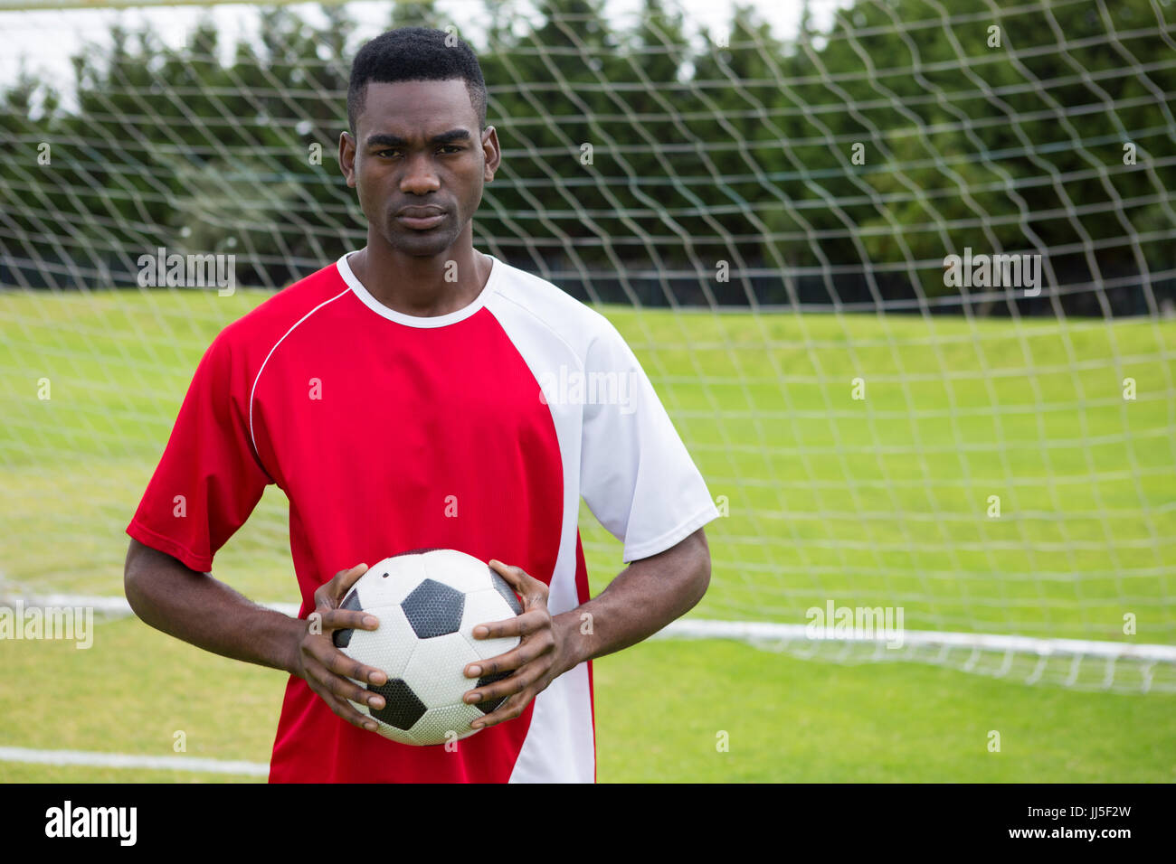 Goalkeeper pointing soccer ball hi-res stock photography and images - Alamy