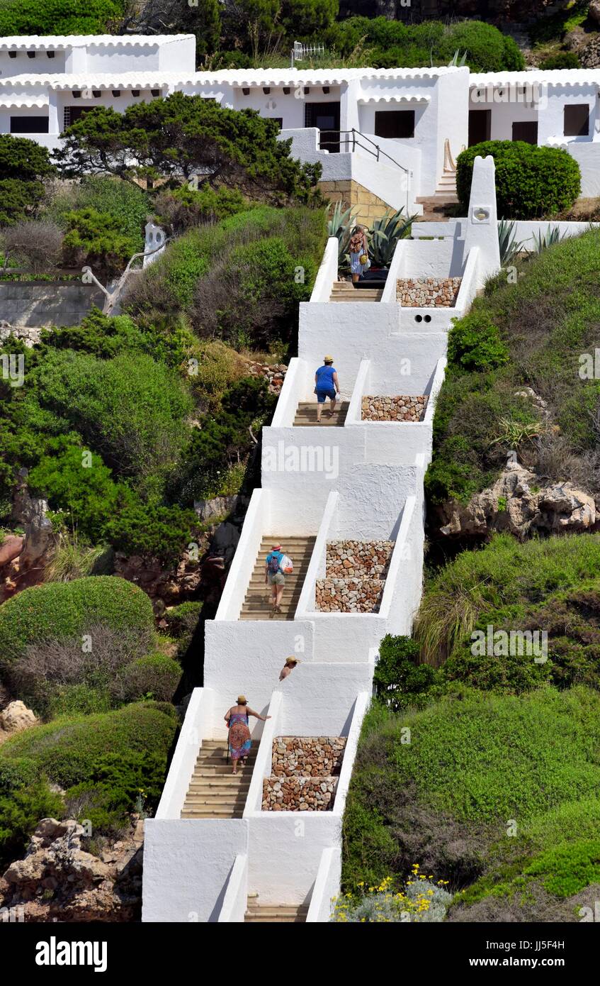 People walking up steps Cala morell Menorca Minorca Spain Stock Photo ...