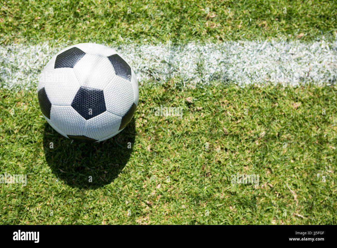 Higha angle view soccer ball on field Stock Photo - Alamy