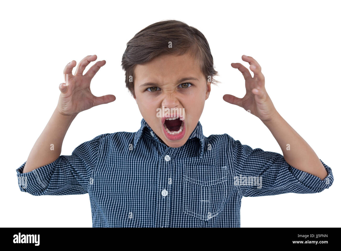 Cute boy shouting against white background Stock Photo - Alamy