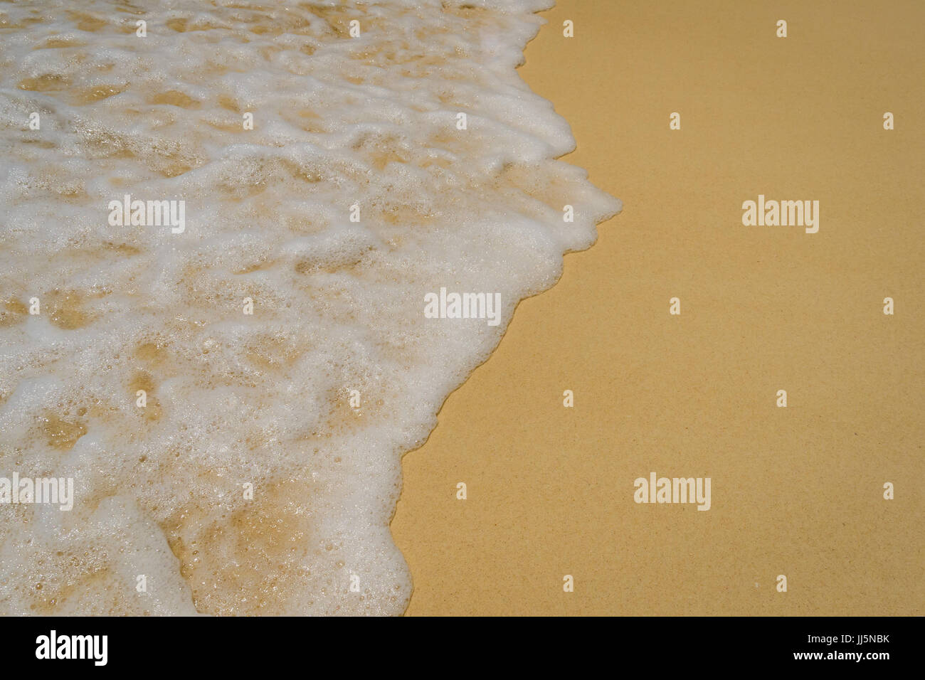 Gentle wave on beach hi-res stock photography and images - Alamy