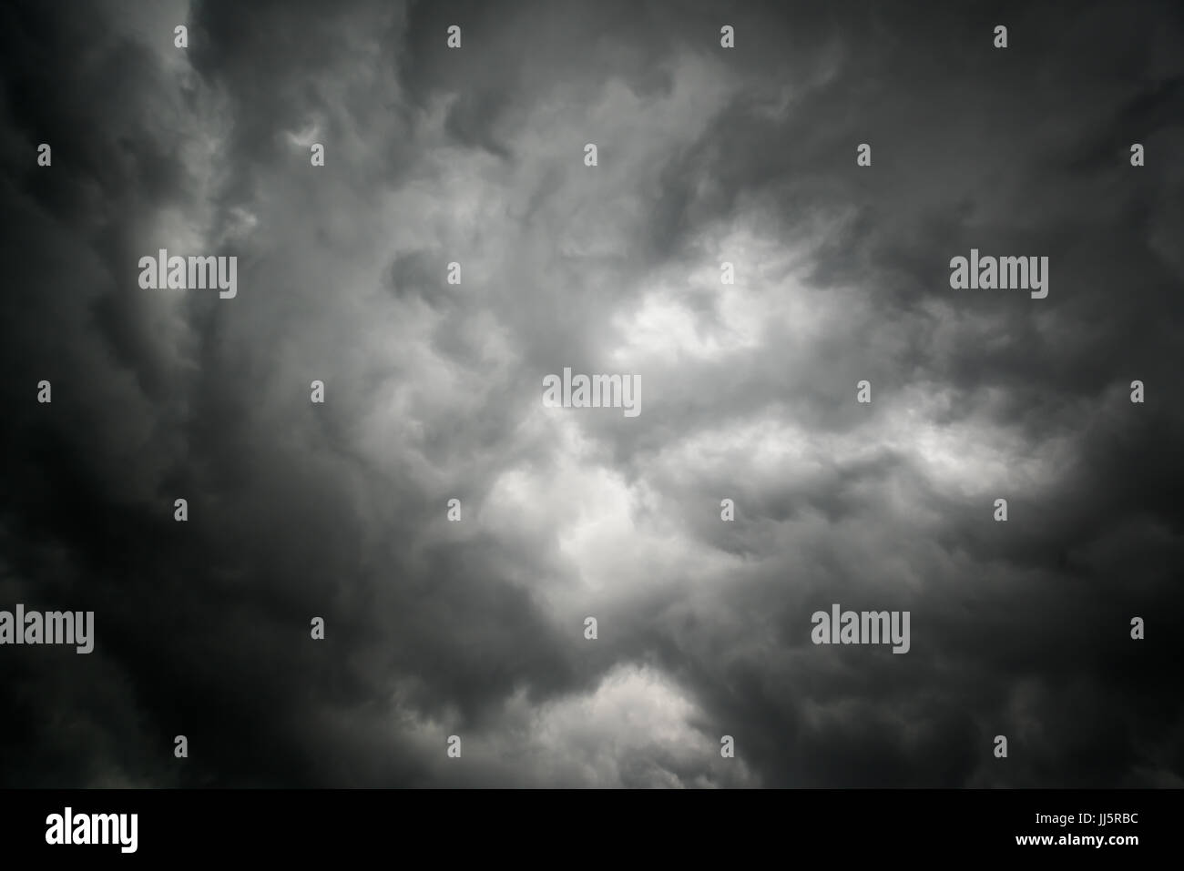 storm cloud background during raining. Dark Clouds. Huge black clouds ...