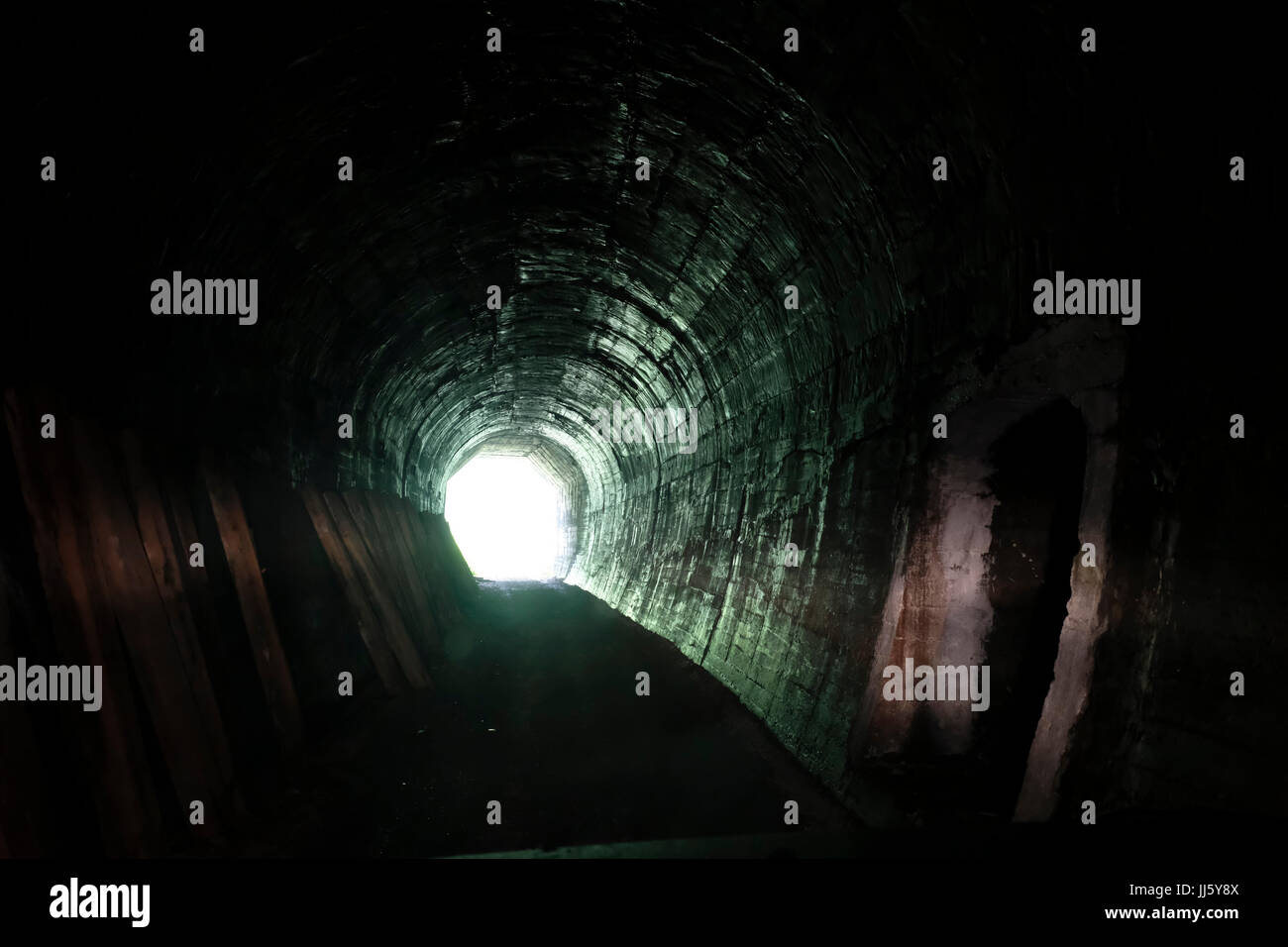 An old railroad tunnel of the Kholmsk-Yuzhno-Sakhalinsk railway line ...