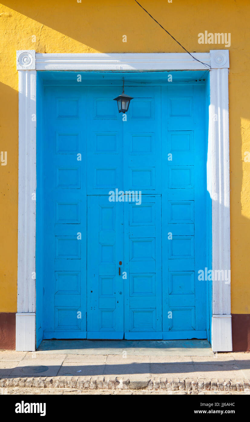 Typical colonial building with small door in the big gate, Trinidad ...