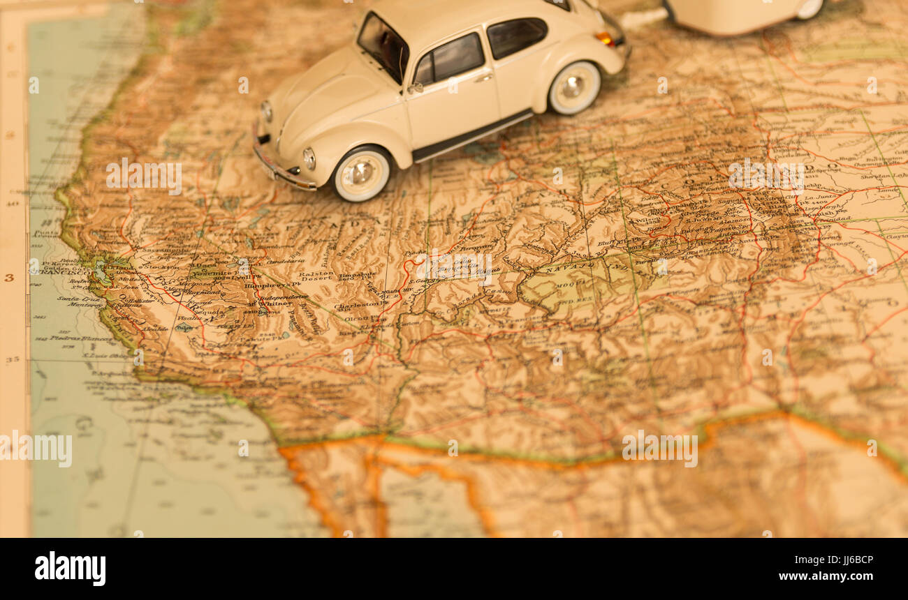 old toy car on a old map Stock Photo - Alamy