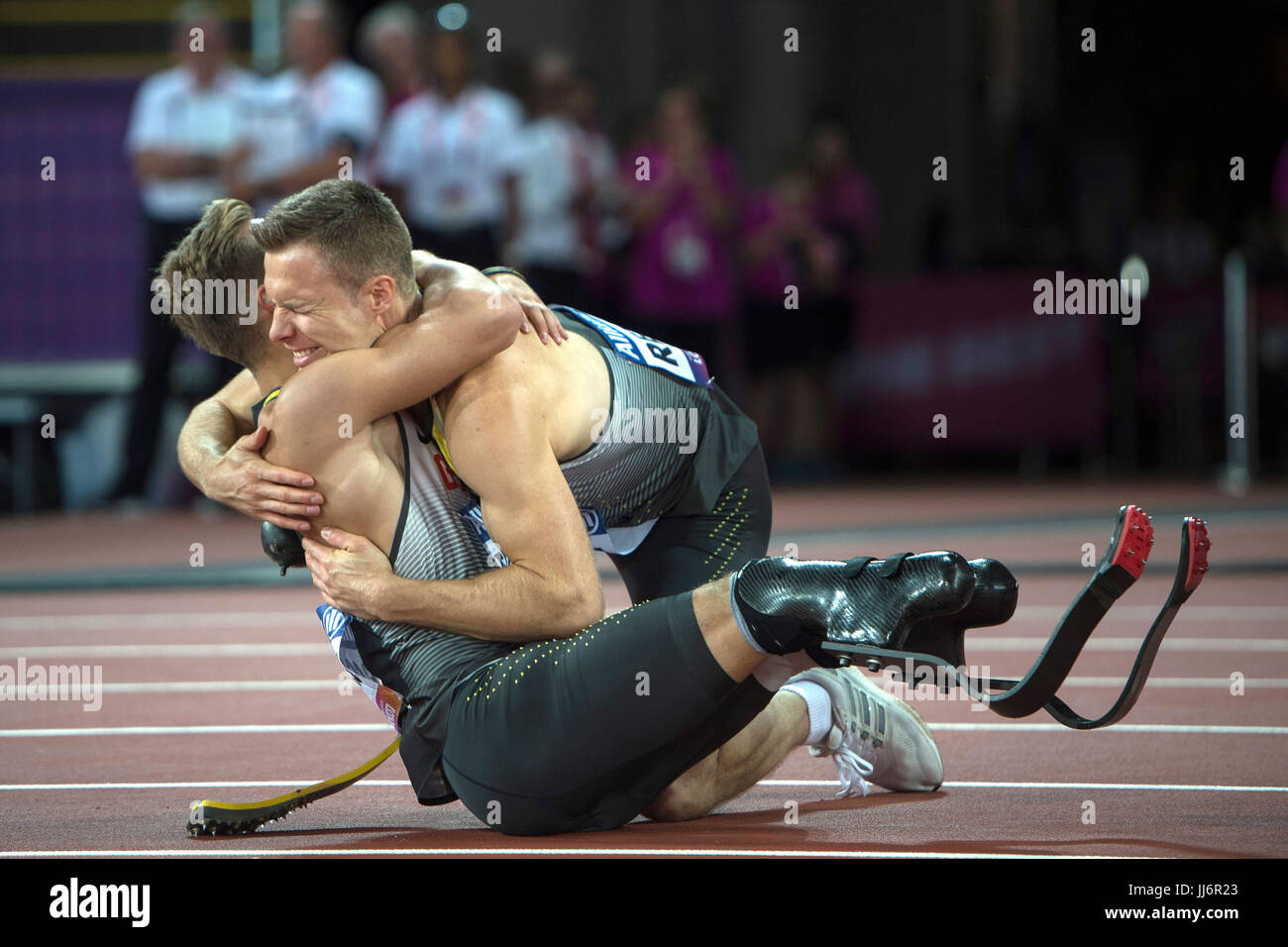 Germany's Markus Rehm (right) congratulates Germany's Johannes Floors ...