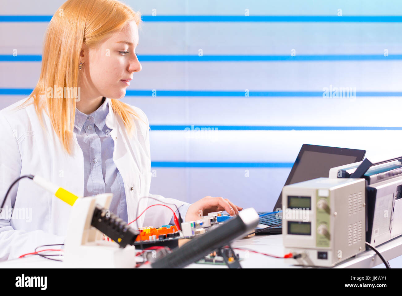 young woman in modern electronics laboratory Stock Photo - Alamy