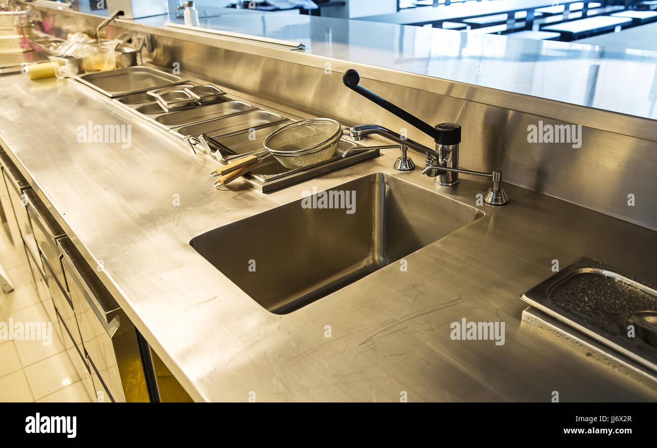 Professional kitchen, view counter in stainless steel Stock Photo - Alamy