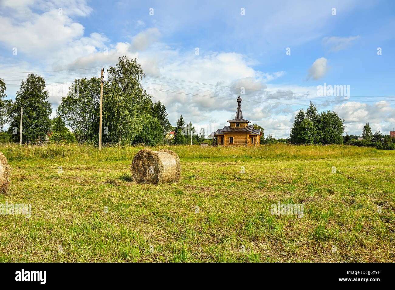 Summer rural landscape with the temple. New Church Stock Photo - Alamy