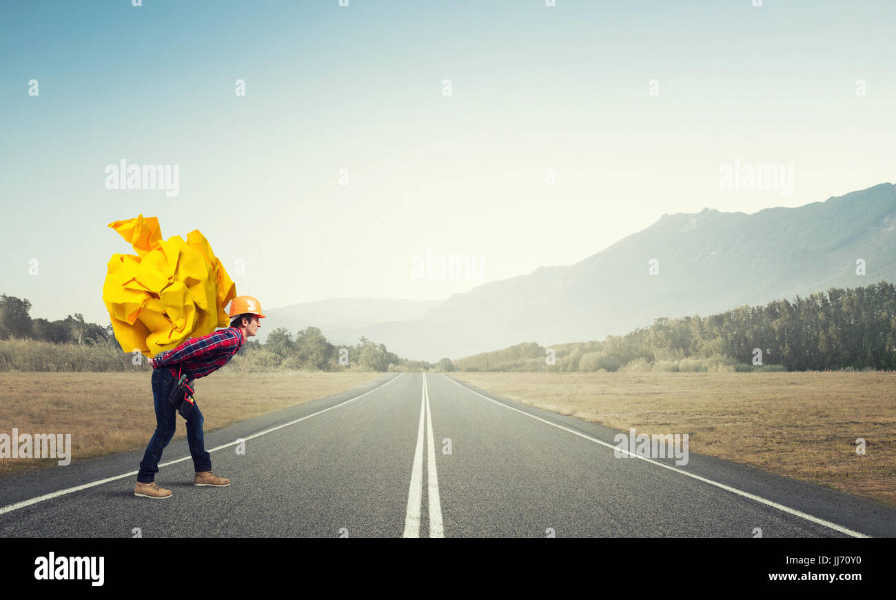Engineer man carry load Stock Photo - Alamy