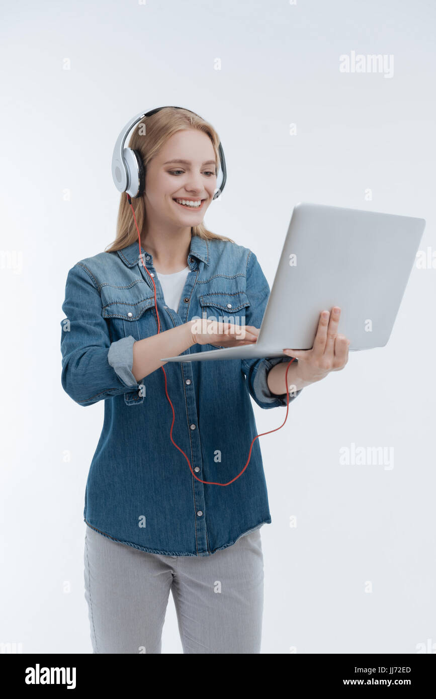 Cute smiling girl having video call Stock Photo - Alamy