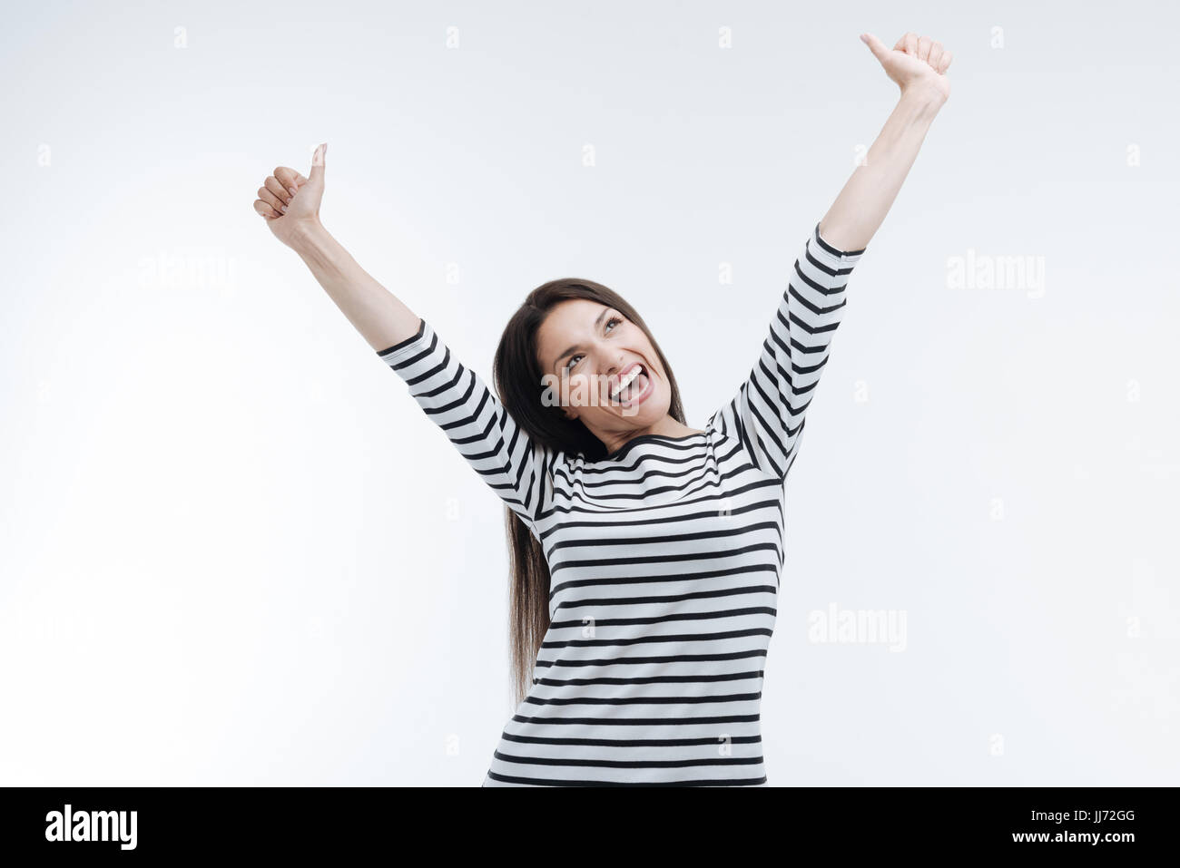 Pleased pretty girl feeling happiness Stock Photo - Alamy