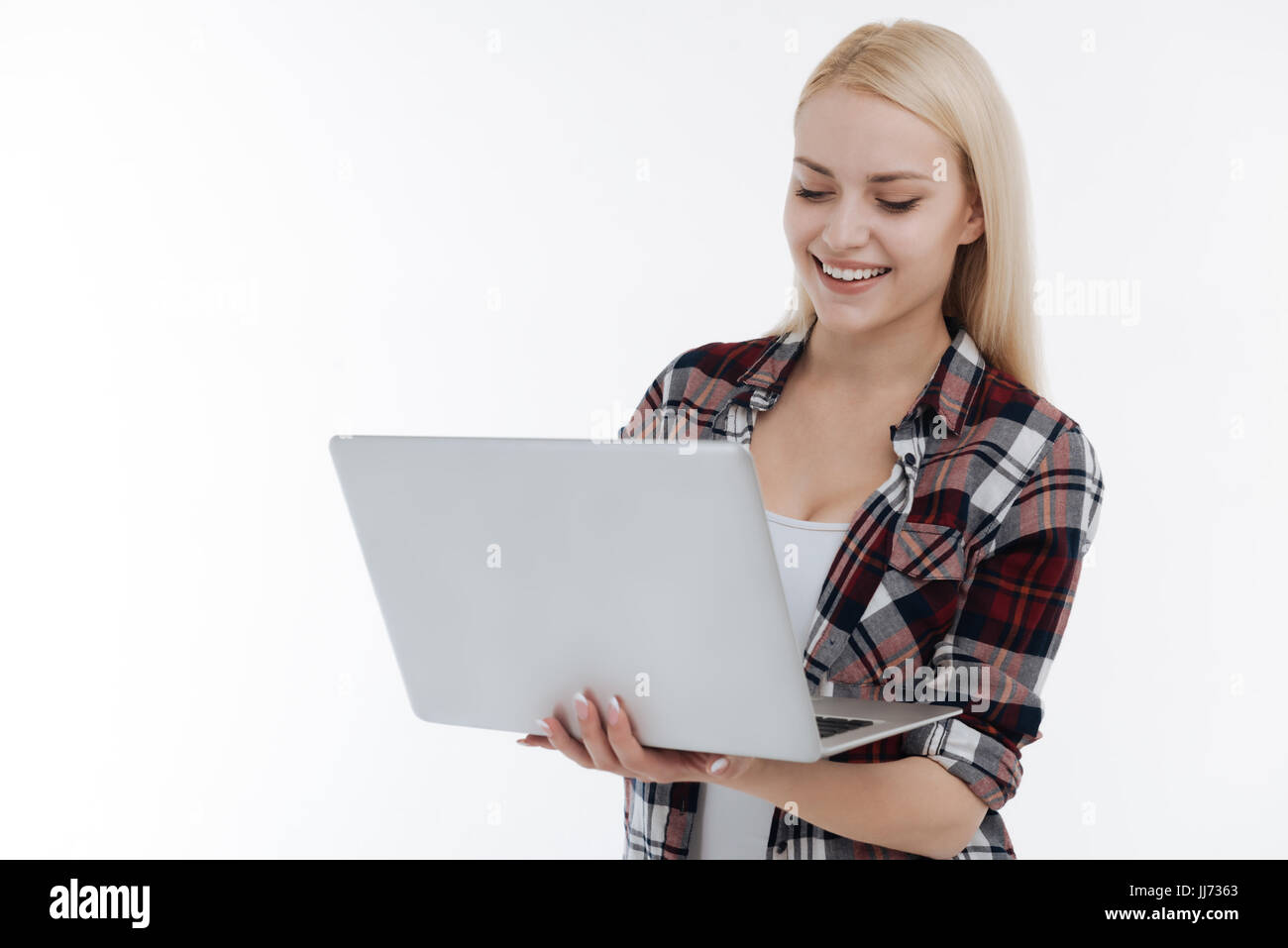 Charming female person working with computer Stock Photo - Alamy