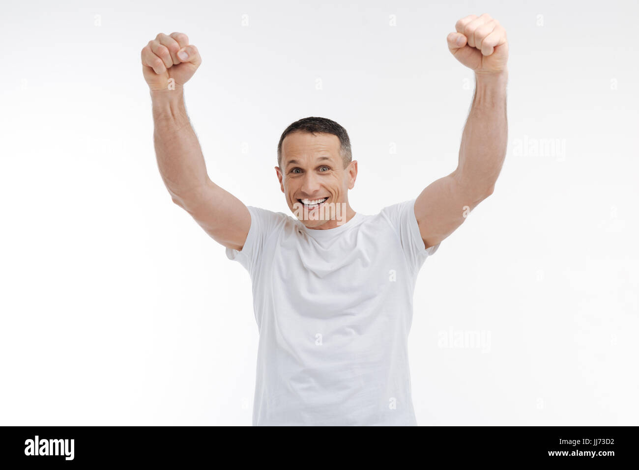 Strong man posing on camera Stock Photo - Alamy