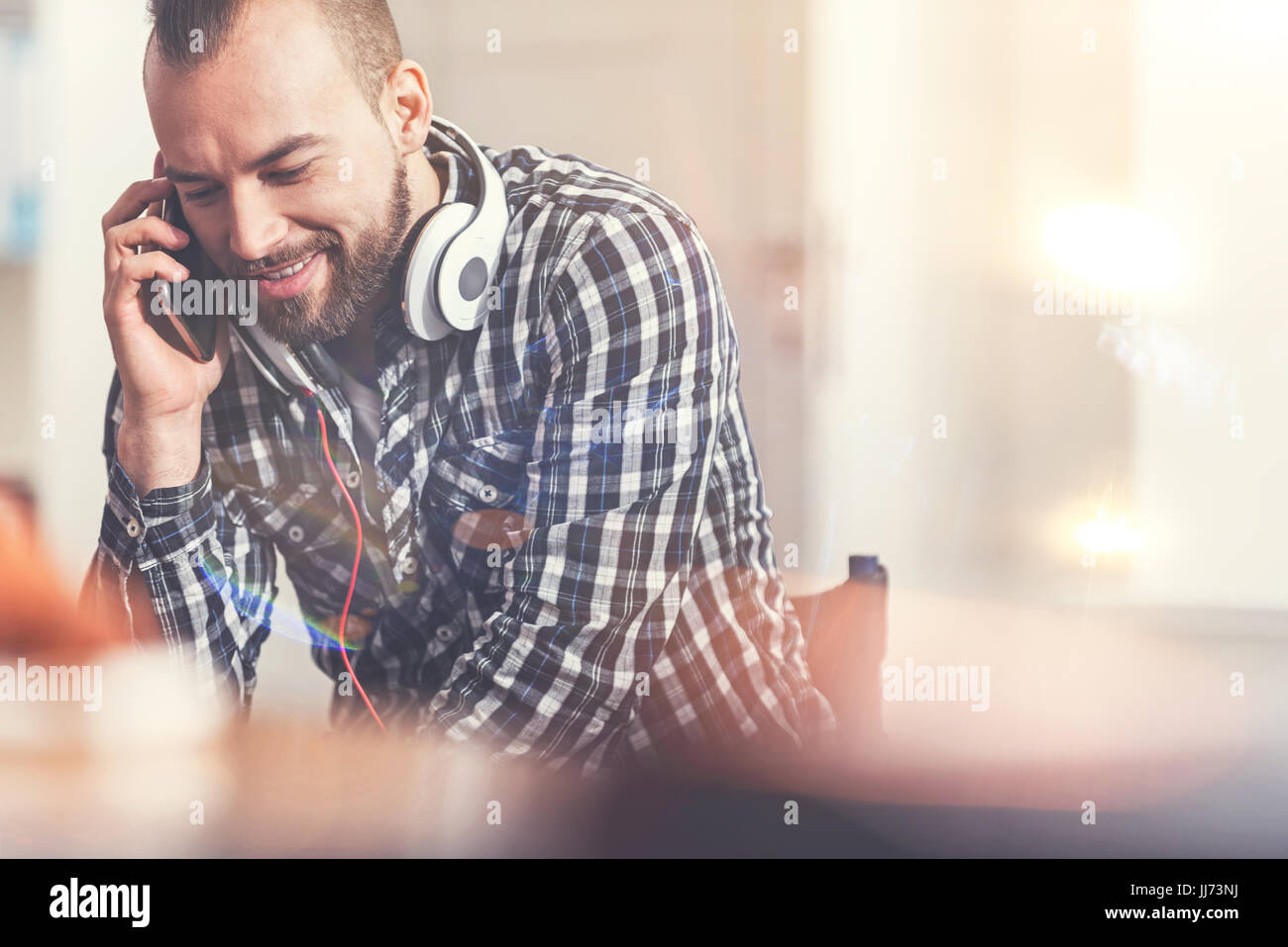 Busy male person having phone call Stock Photo - Alamy