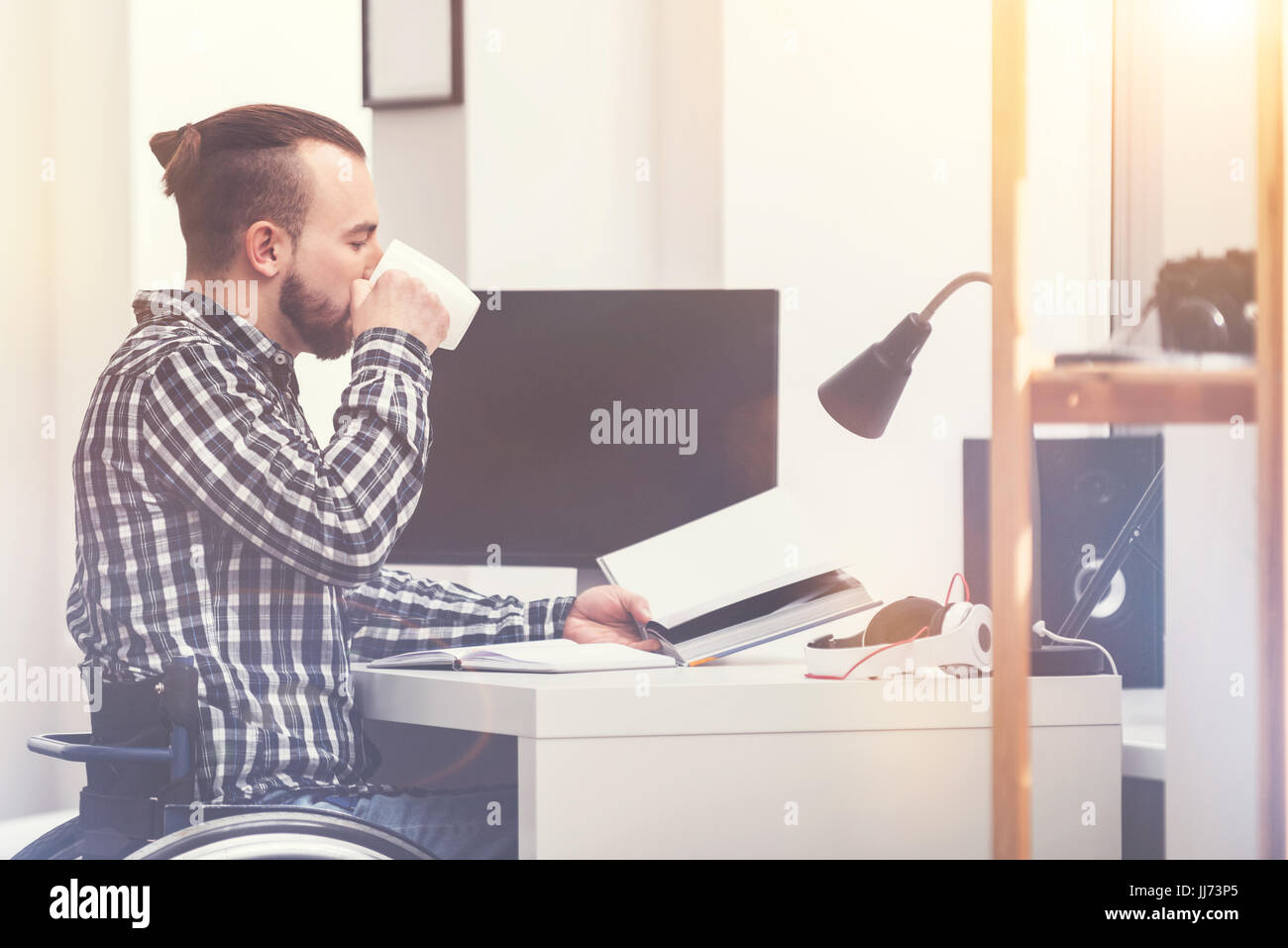 Profile photo of office worker that drinking tea Stock Photo - Alamy