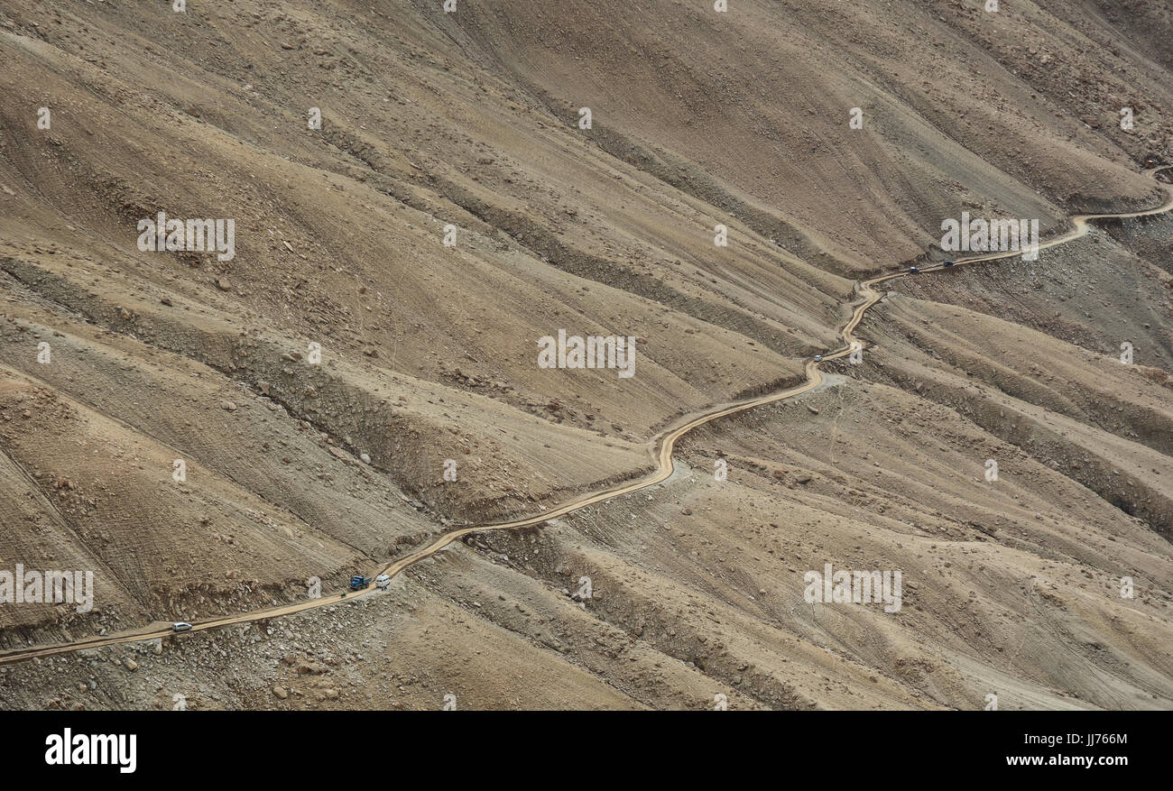 Rural road on the hill in Ladakh, India. Ladakh is a barren yet ...