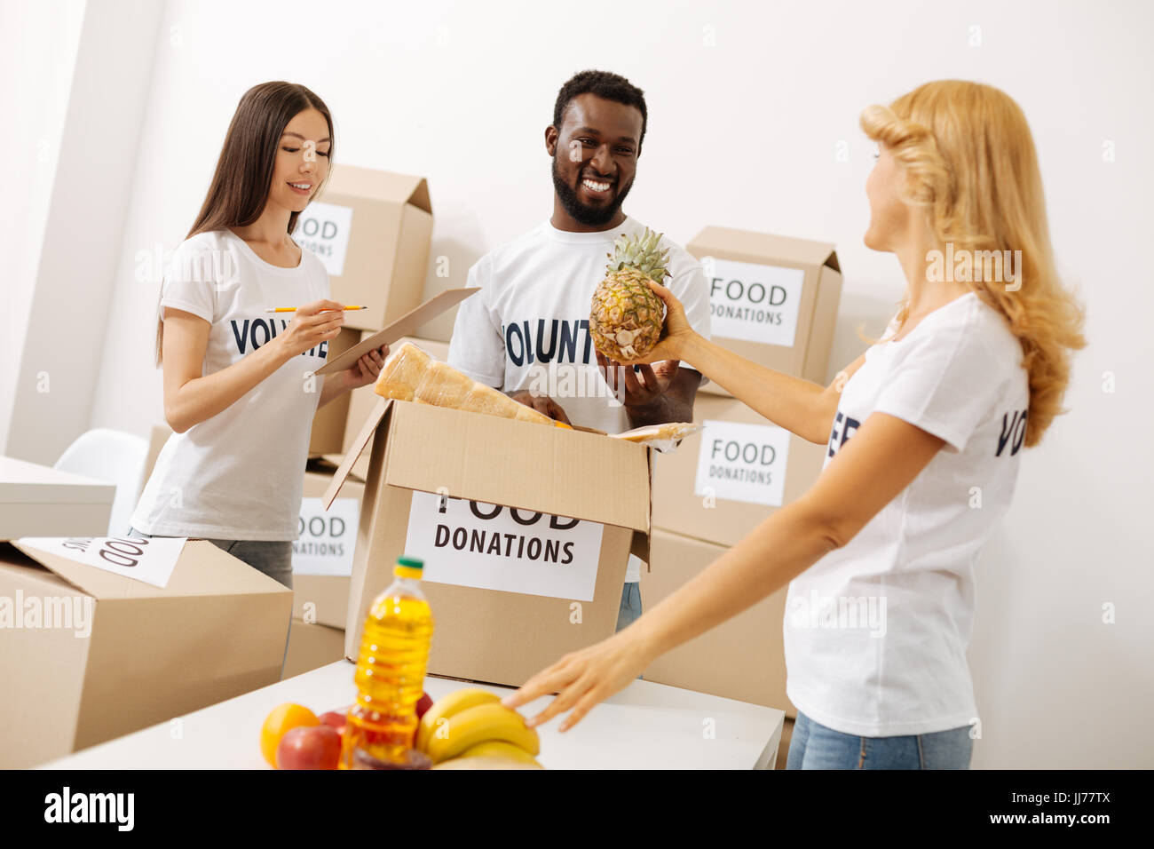 Inspired young people dedicated to a noble cause Stock Photo - Alamy