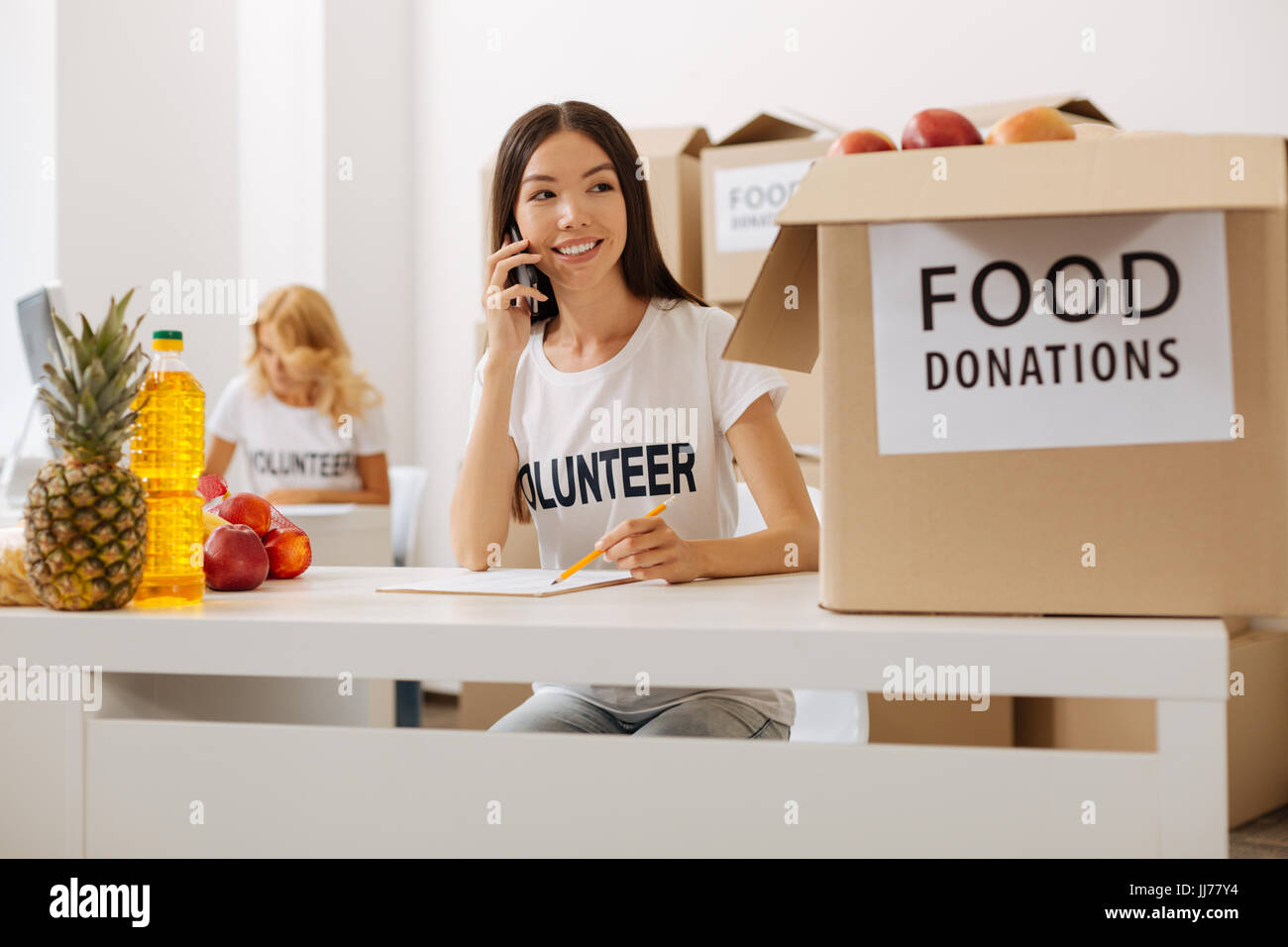 Passionate nice woman making a phone call Stock Photo - Alamy