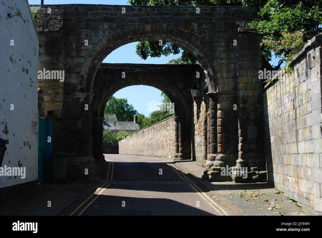 an old narrow street under historic gate in Hexham Stock Photo - Alamy