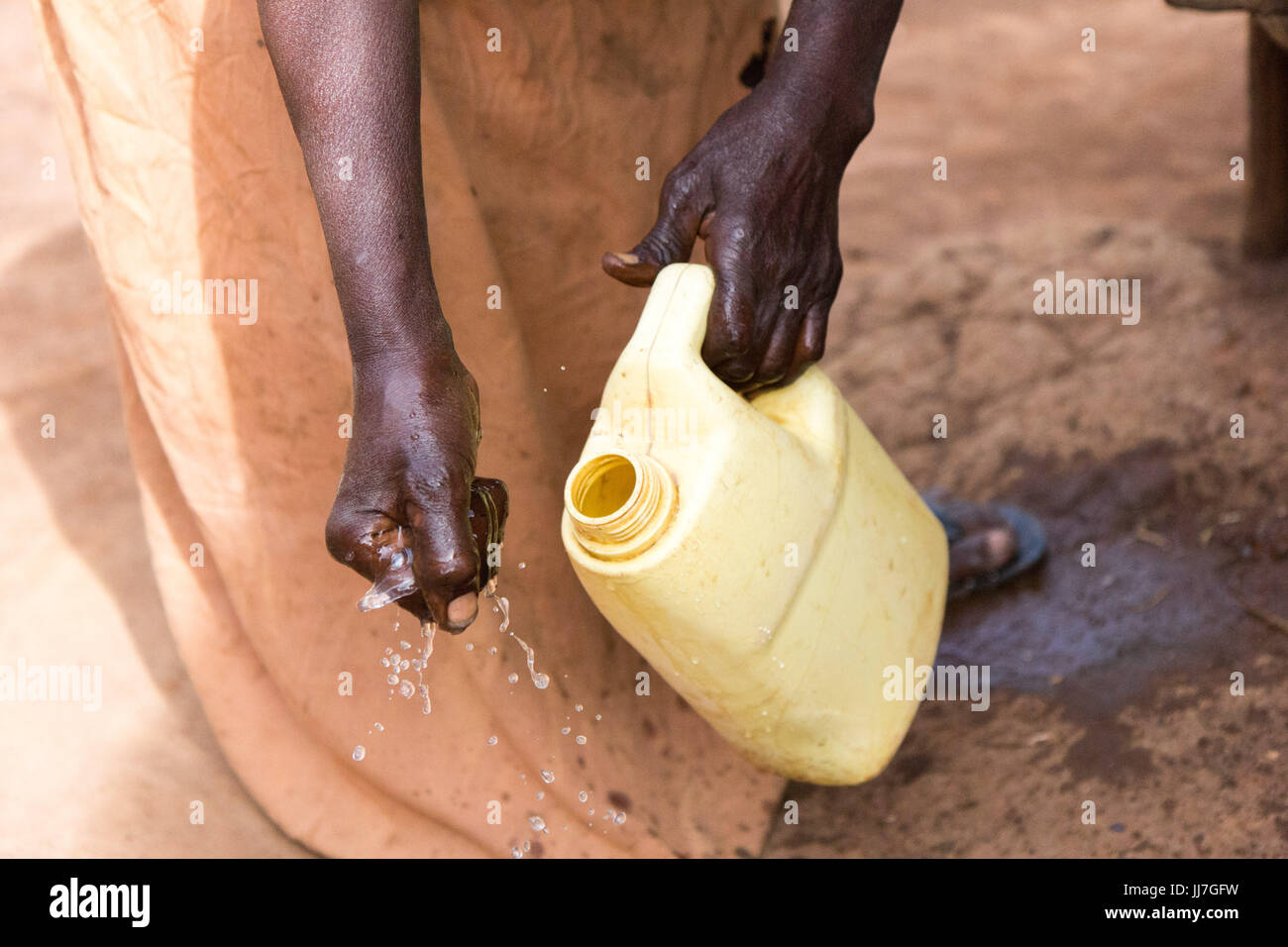 Hand pouring water hi-res stock photography and images - Alamy