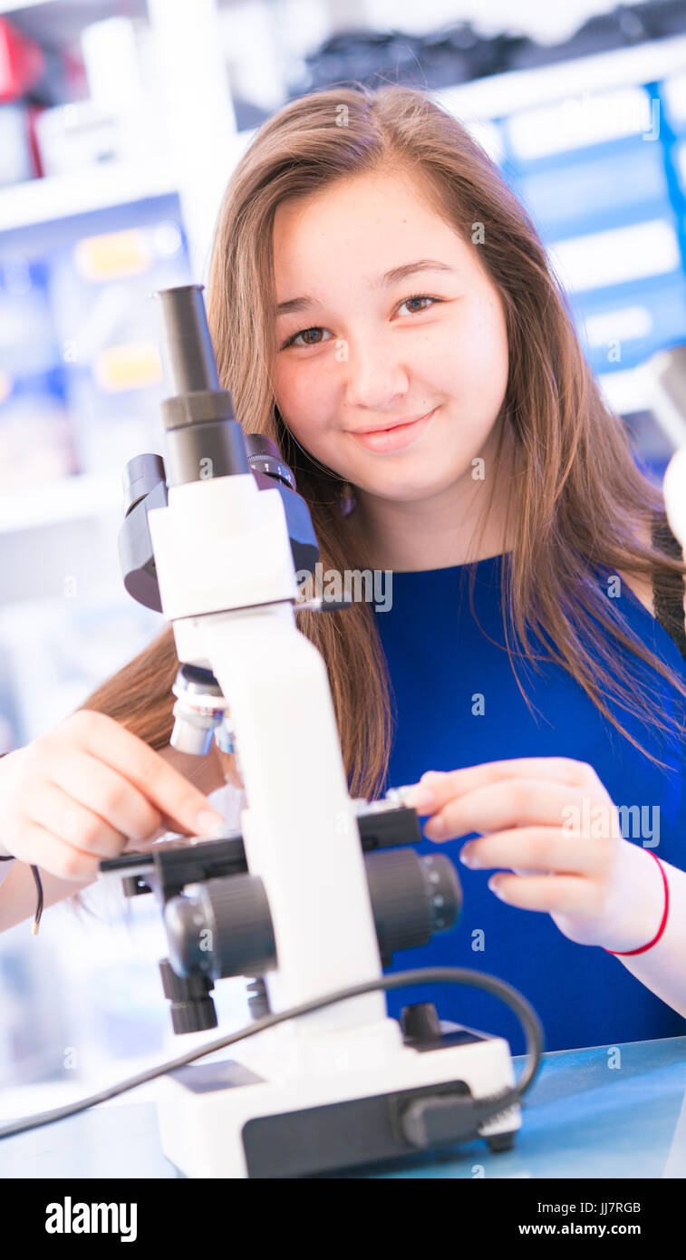 School girl in science class Stock Photo - Alamy