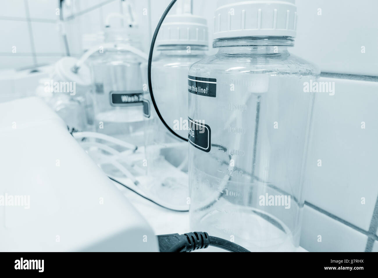 Bottles in science laboratory Stock Photo - Alamy