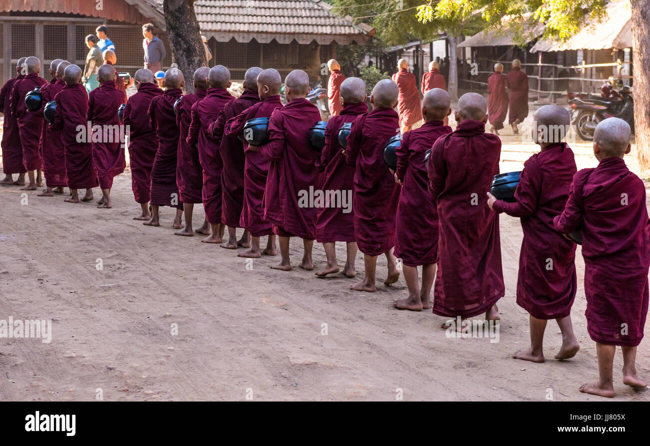 Novice monks procession hi-res stock photography and images - Alamy