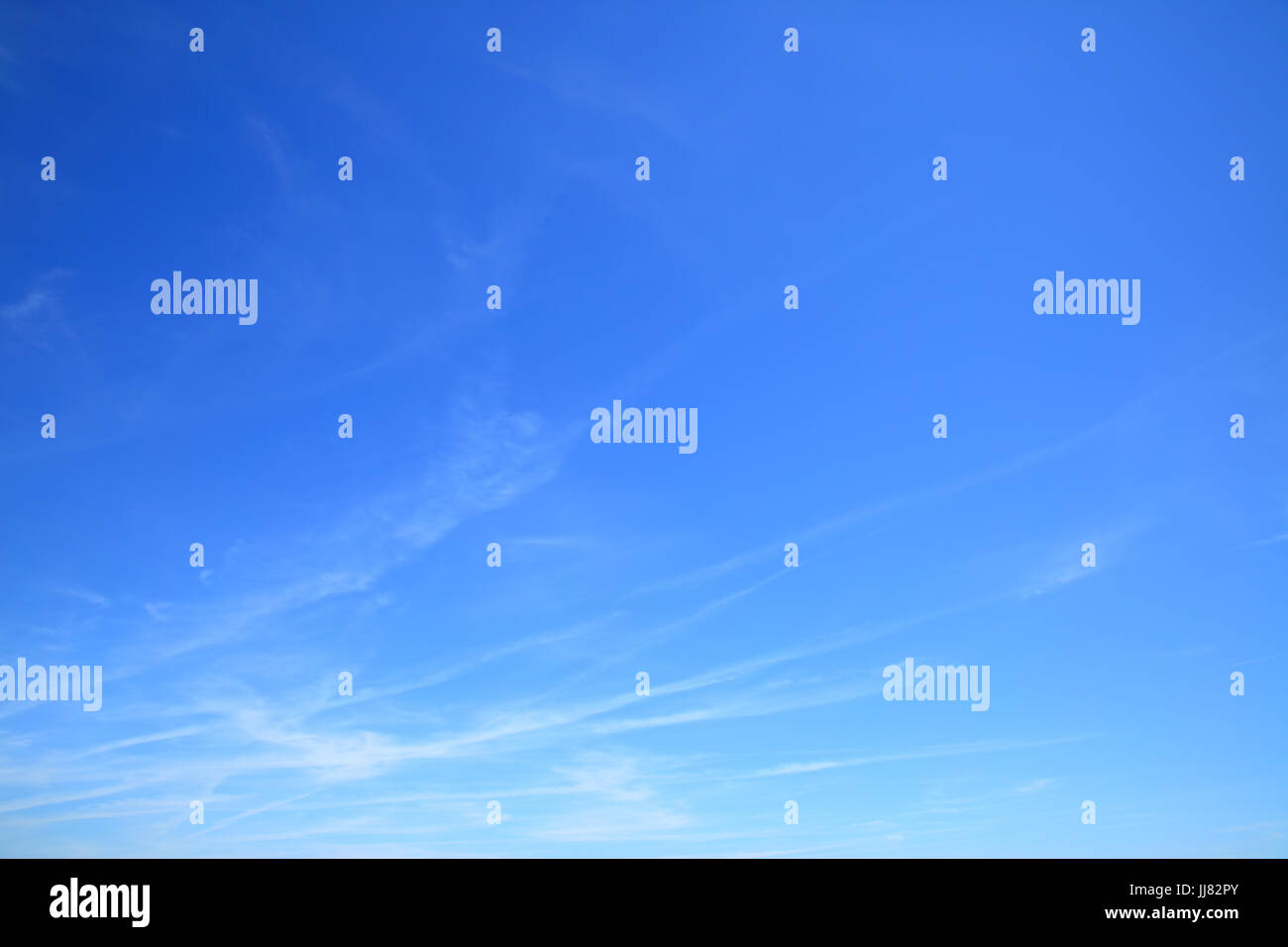 Almost clear blue sky - photo background Stock Photo - Alamy