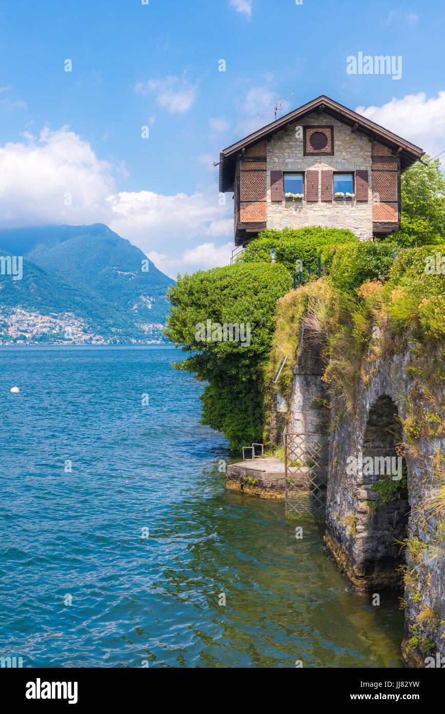 Alps style house next to Lake Como, Italy on a beautiful summer day ...