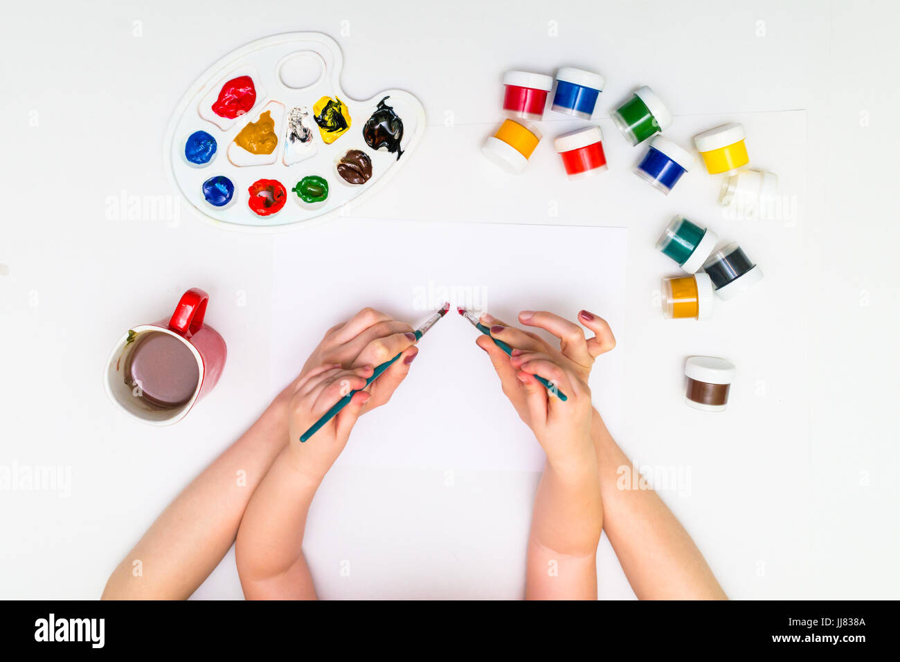 Child's hands painting a heart Stock Photo - Alamy