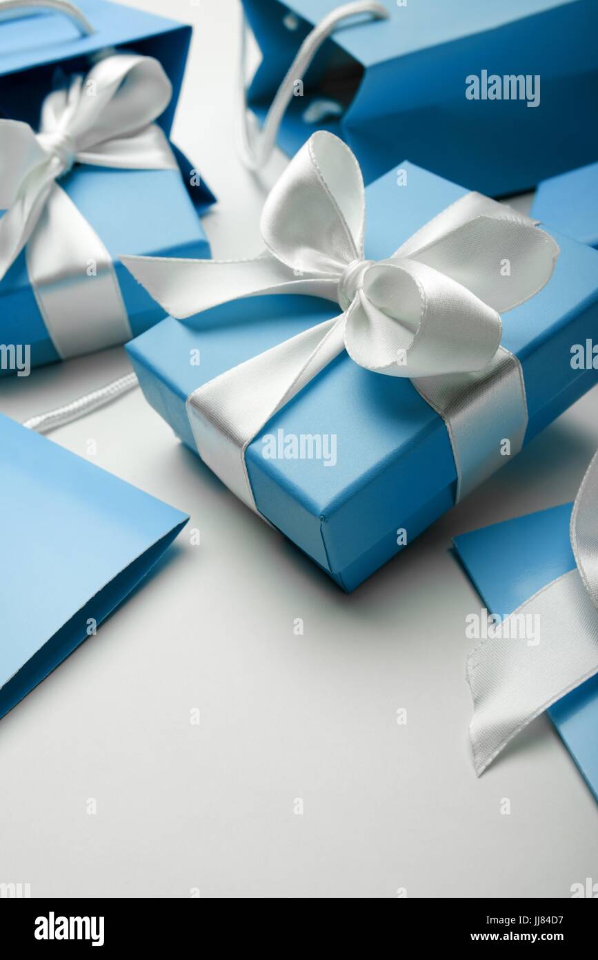 Luxury boxes tied with a white ribbon Stock Photo - Alamy