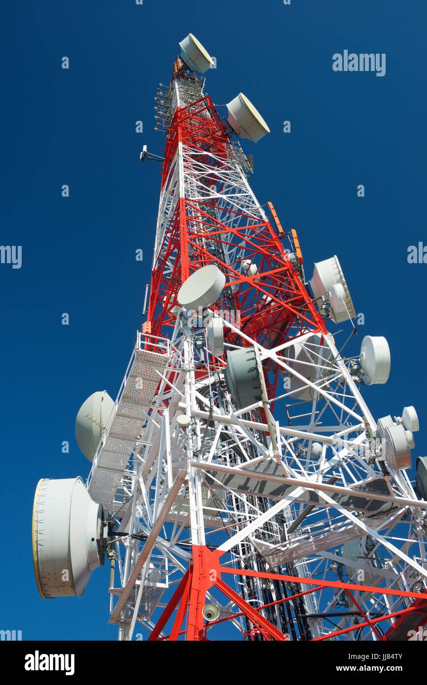 Telecommunications tower with clear blue sky Stock Photo - Alamy
