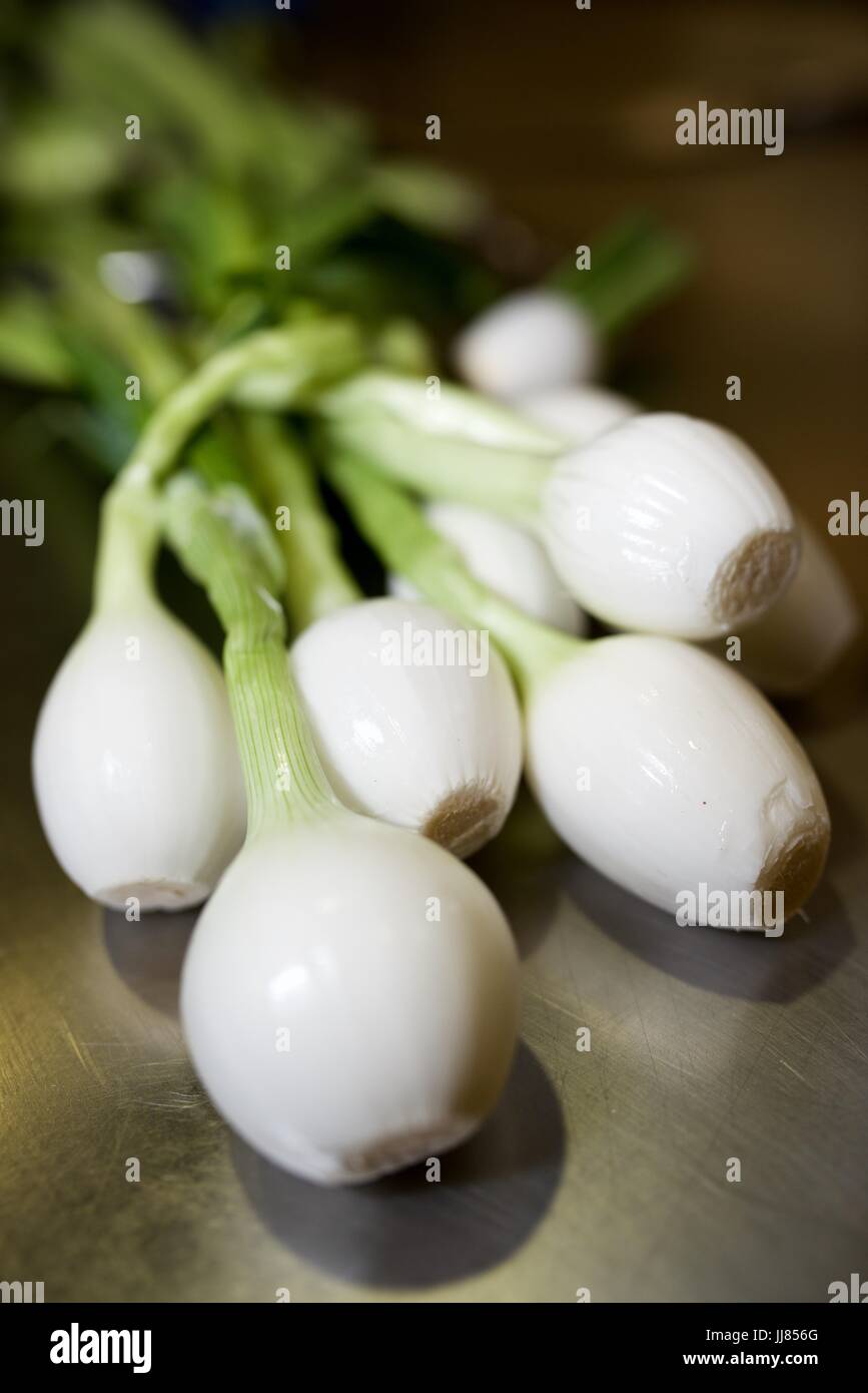 White onions ready to be cooked Stock Photo - Alamy