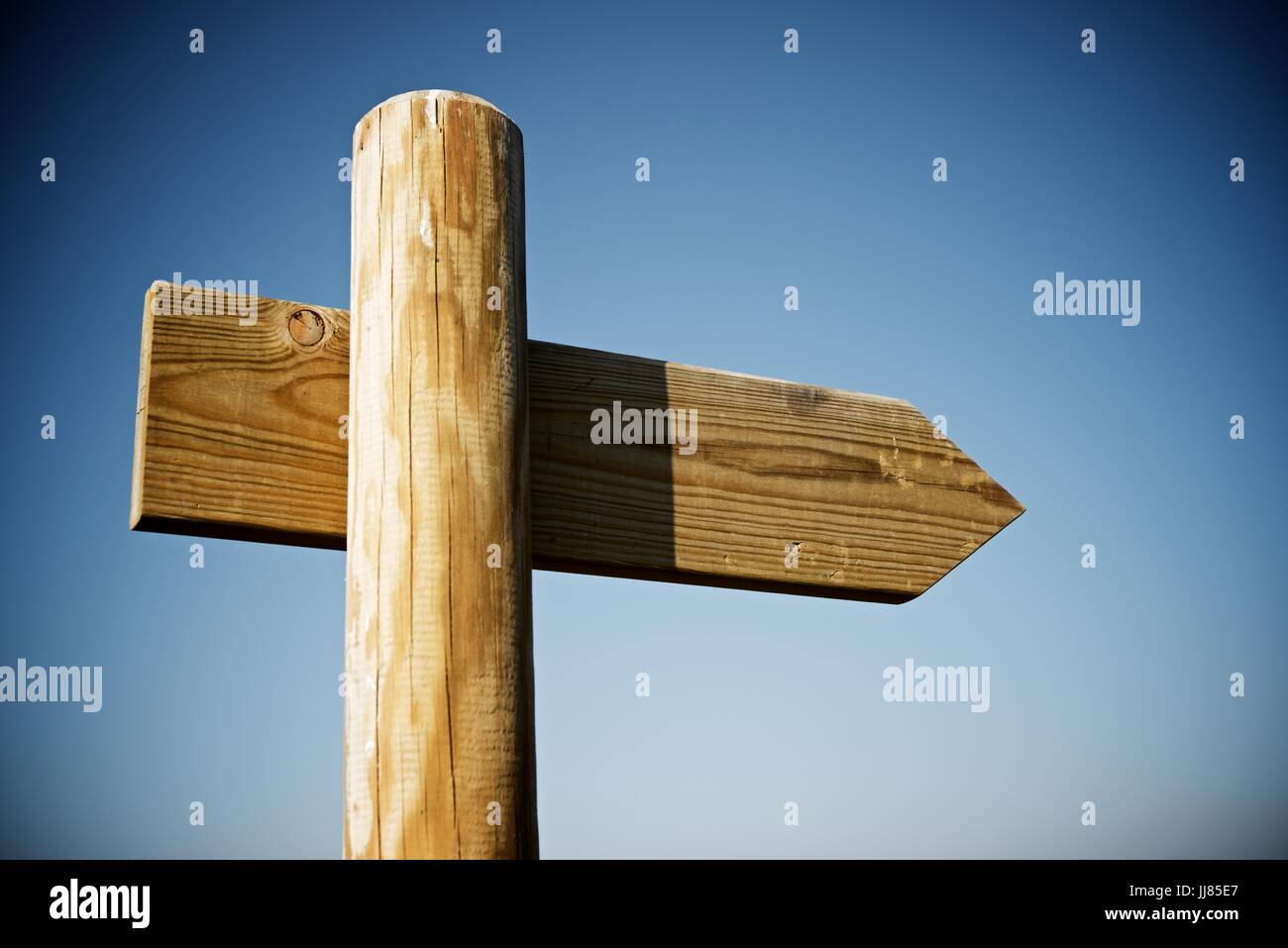 View of a directional wood signal Stock Photo - Alamy