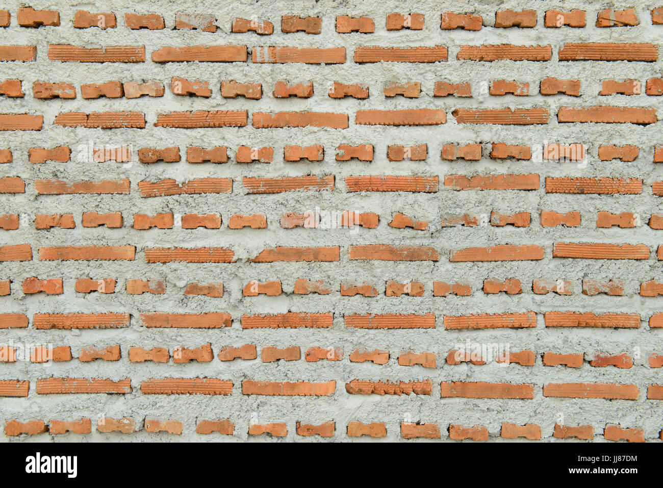 Brick wall texture on construction site Stock Photo - Alamy