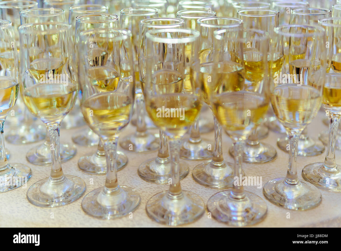 Champagne Glasses Ready To Be Served At Special Event Stock Photo - Alamy