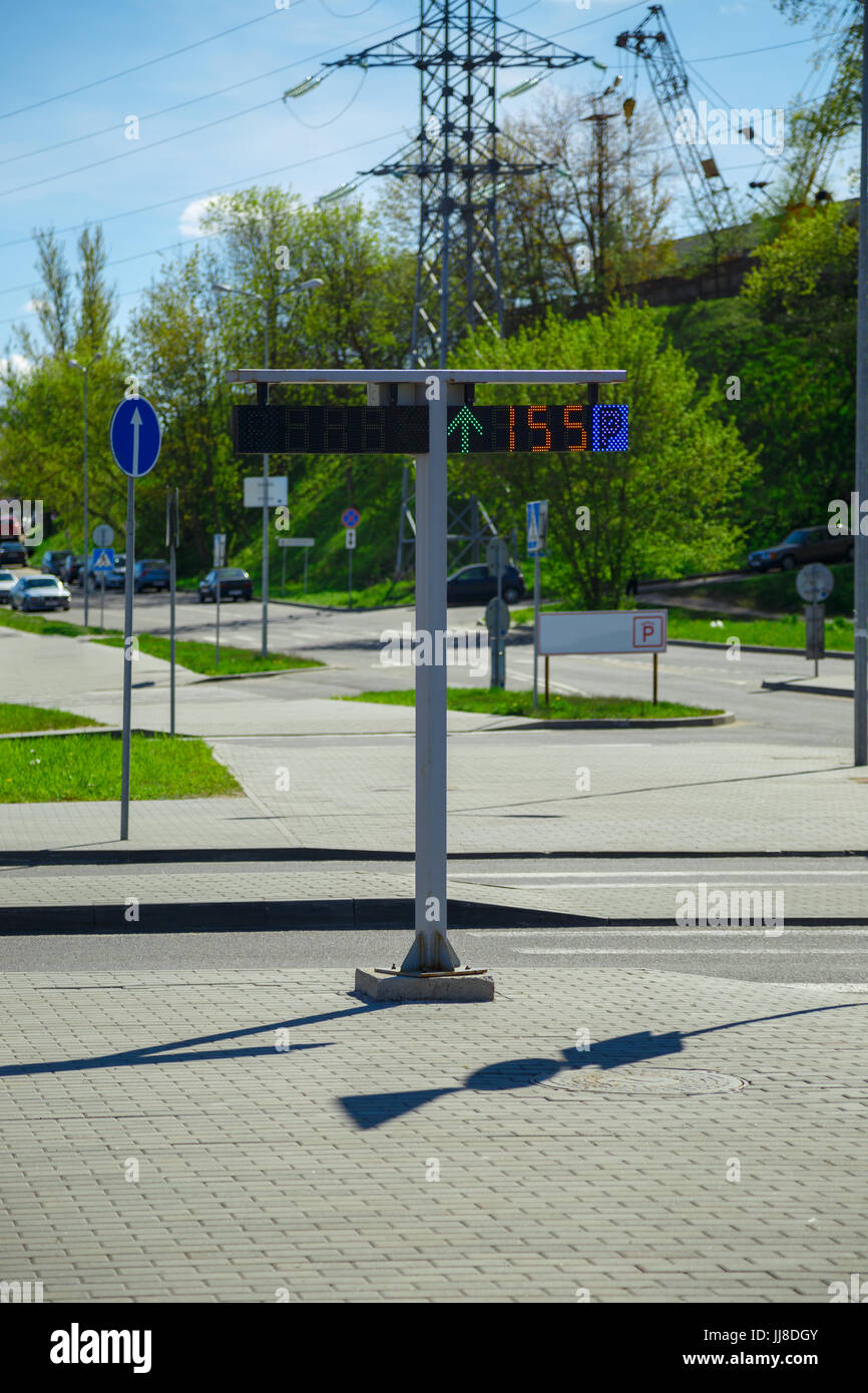 Digital parking sign on the street with the number of available places ...