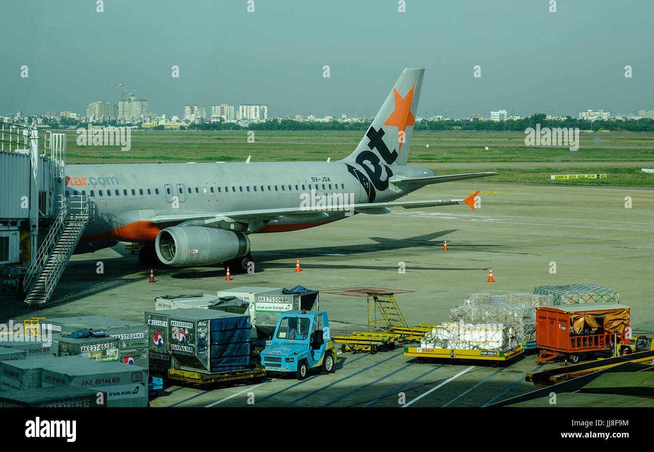Saigon, Vietnam - Jan 2, 2017. Jetstar airplane docks at Tan Son Nhat ...