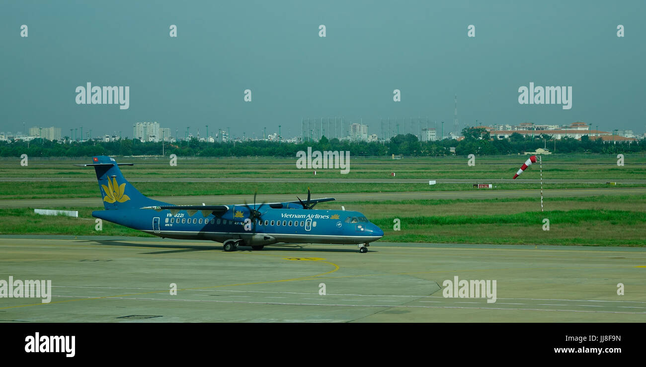 Saigon, Vietnam - Jan 2, 2017. ATR-72 airplane on runway at Tan Son ...